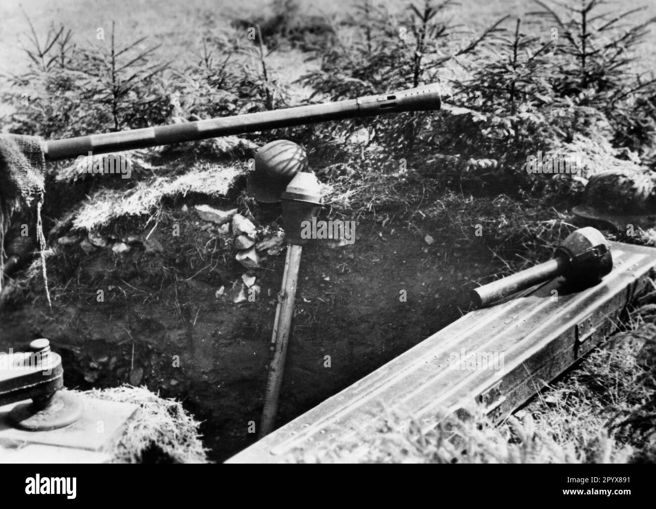 In an anti-aircraft position, bazookas and, on the right, a shaped ...