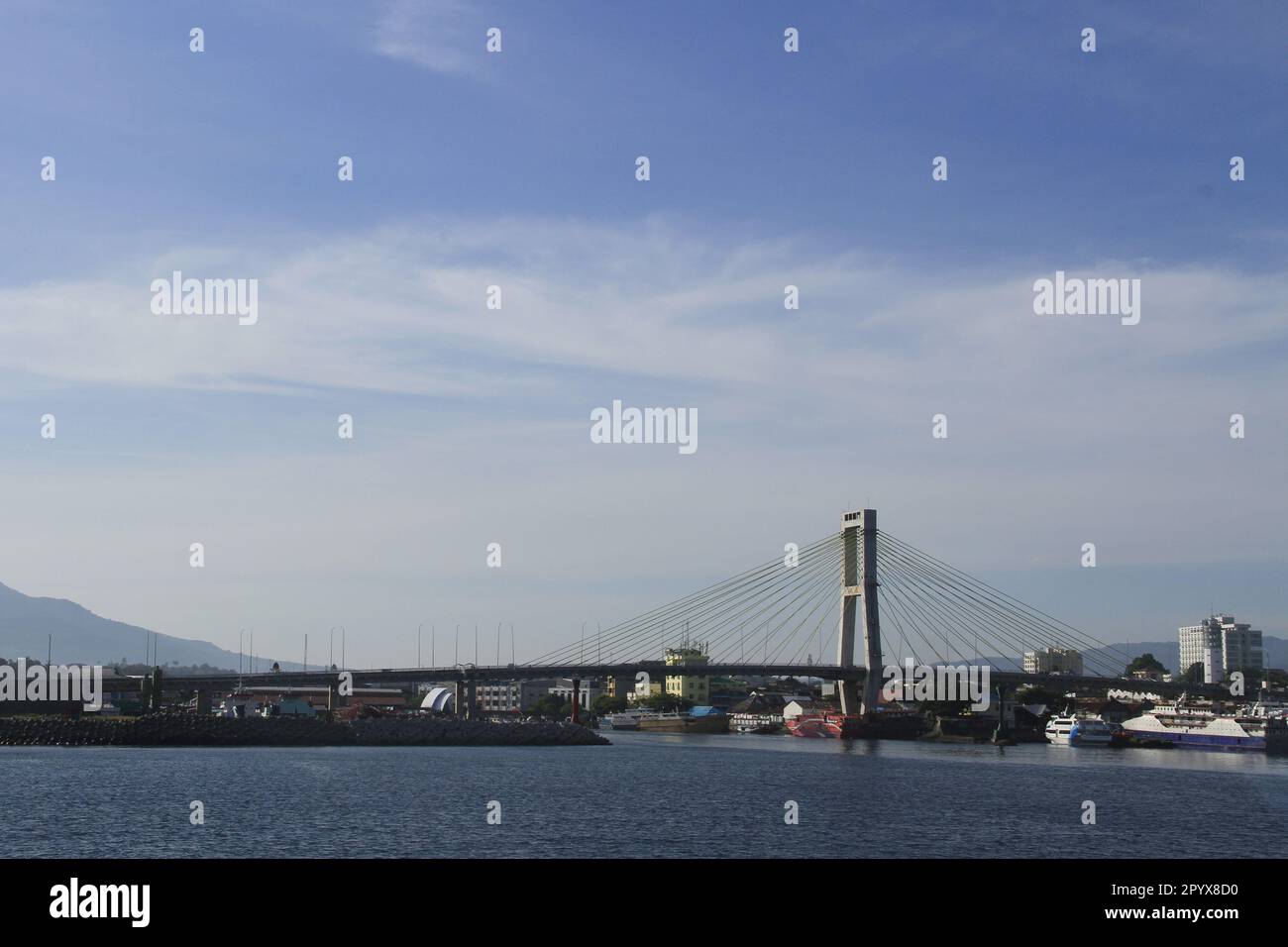 View of the city of Manado in Indonesia from the sea. You can see the ...