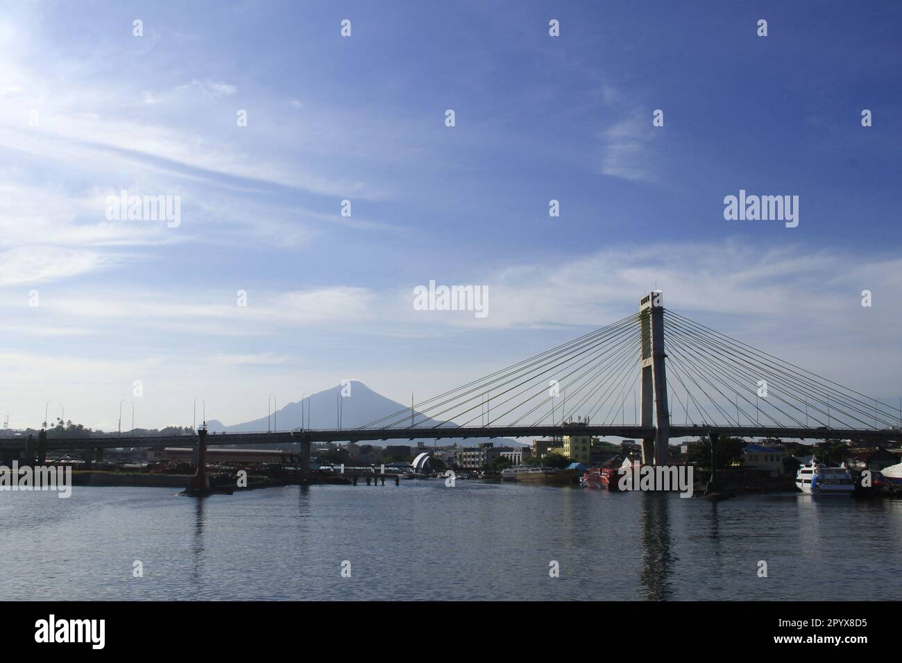 View of the city of Manado in Indonesia from the sea. You can see the ...