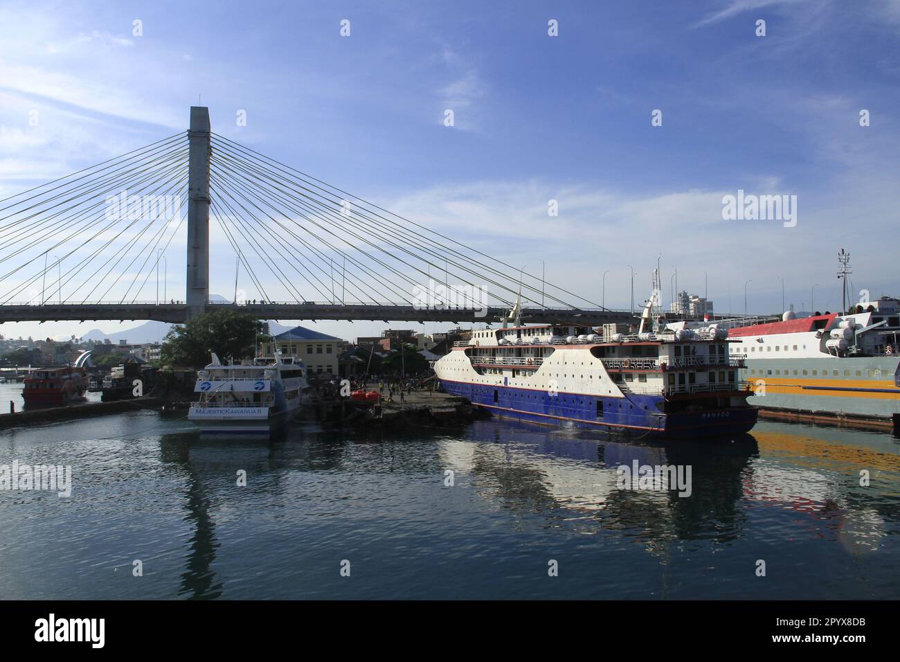 View of the city of Manado in Indonesia from the sea. You can see the ...