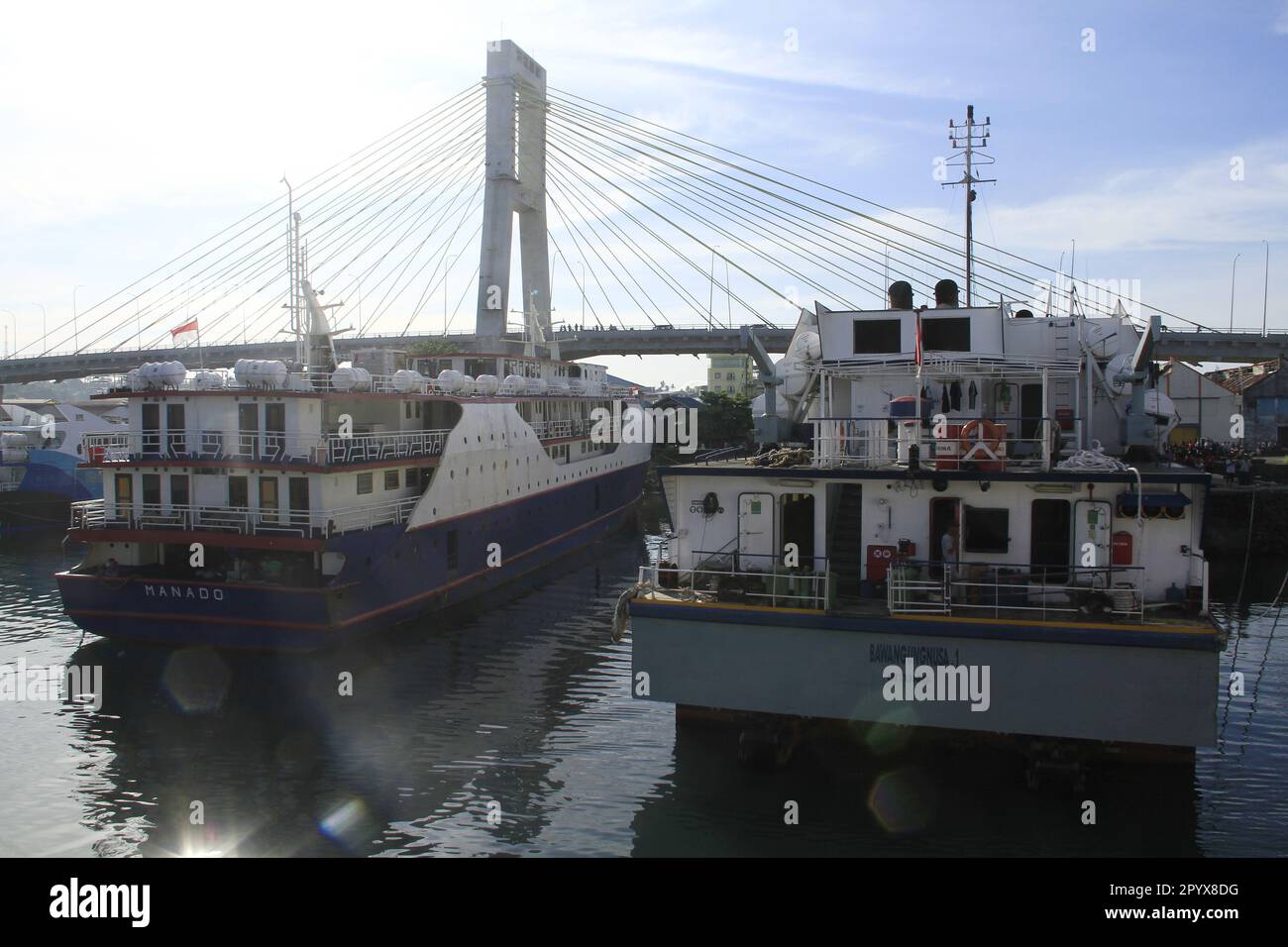 View of the city of Manado in Indonesia from the sea. You can see the ...