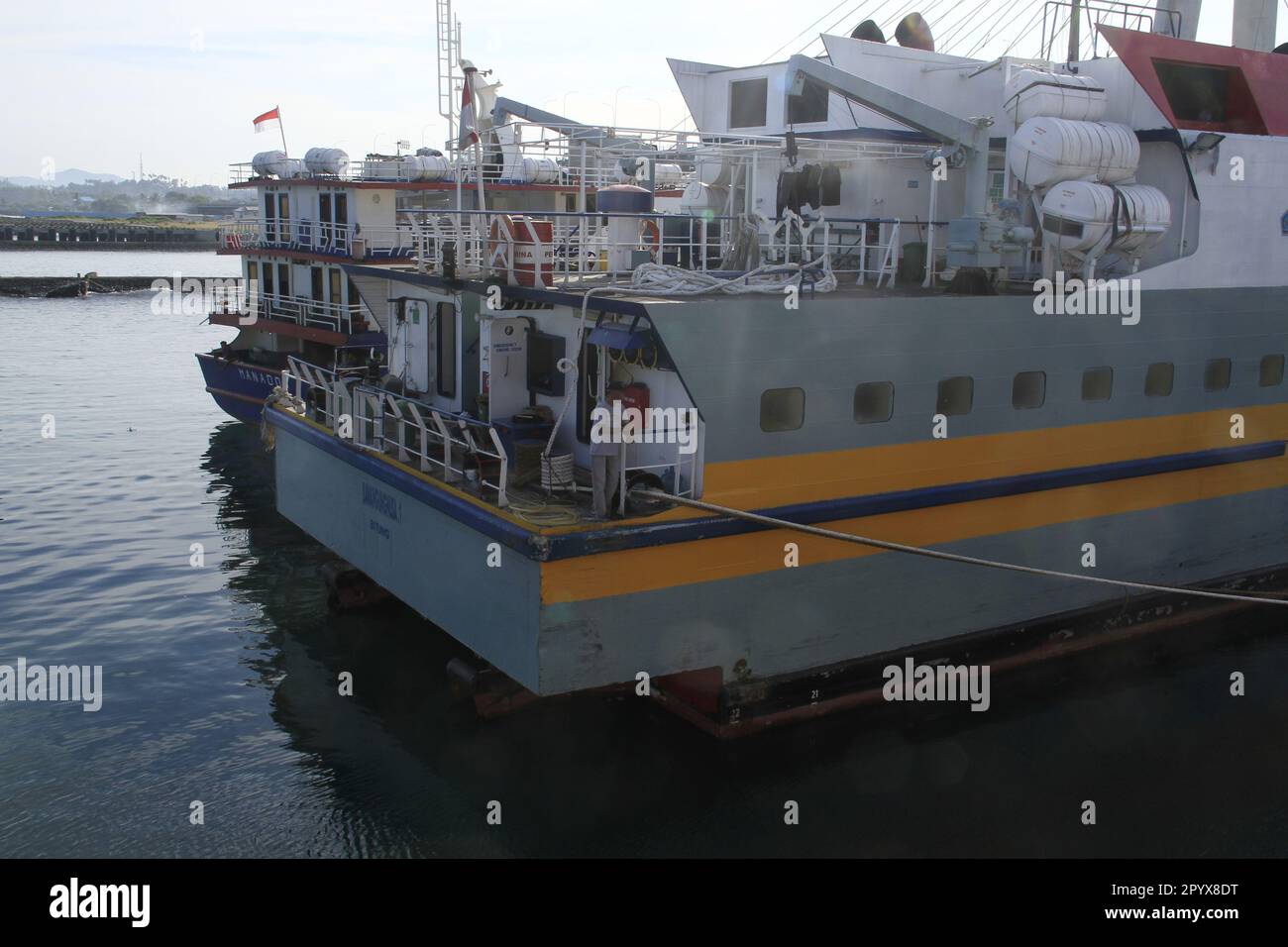 View of the city of Manado in Indonesia from the sea. You can see the ...