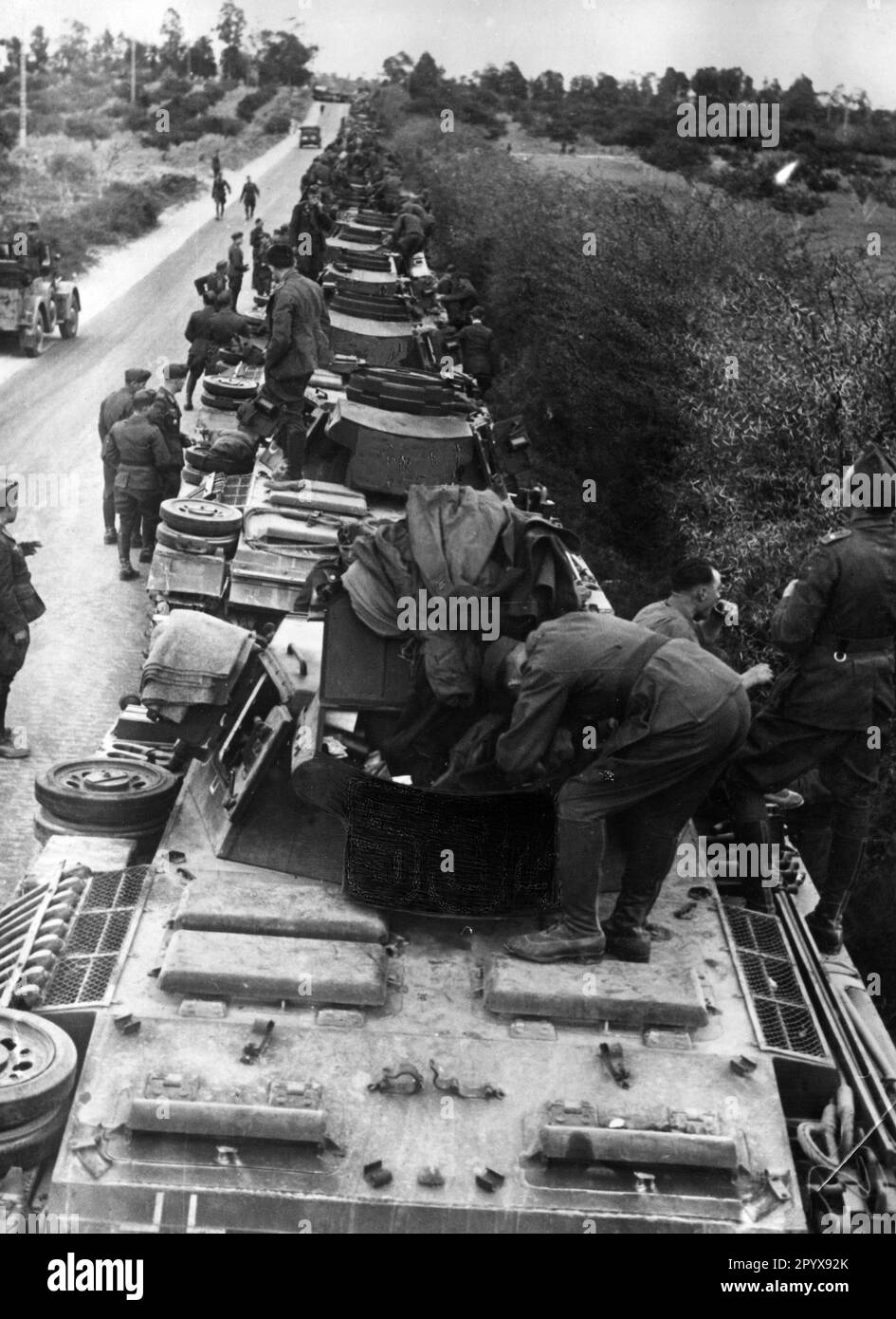 A column of Panzerkampfwagen III of the German Afrika Korps standing on ...