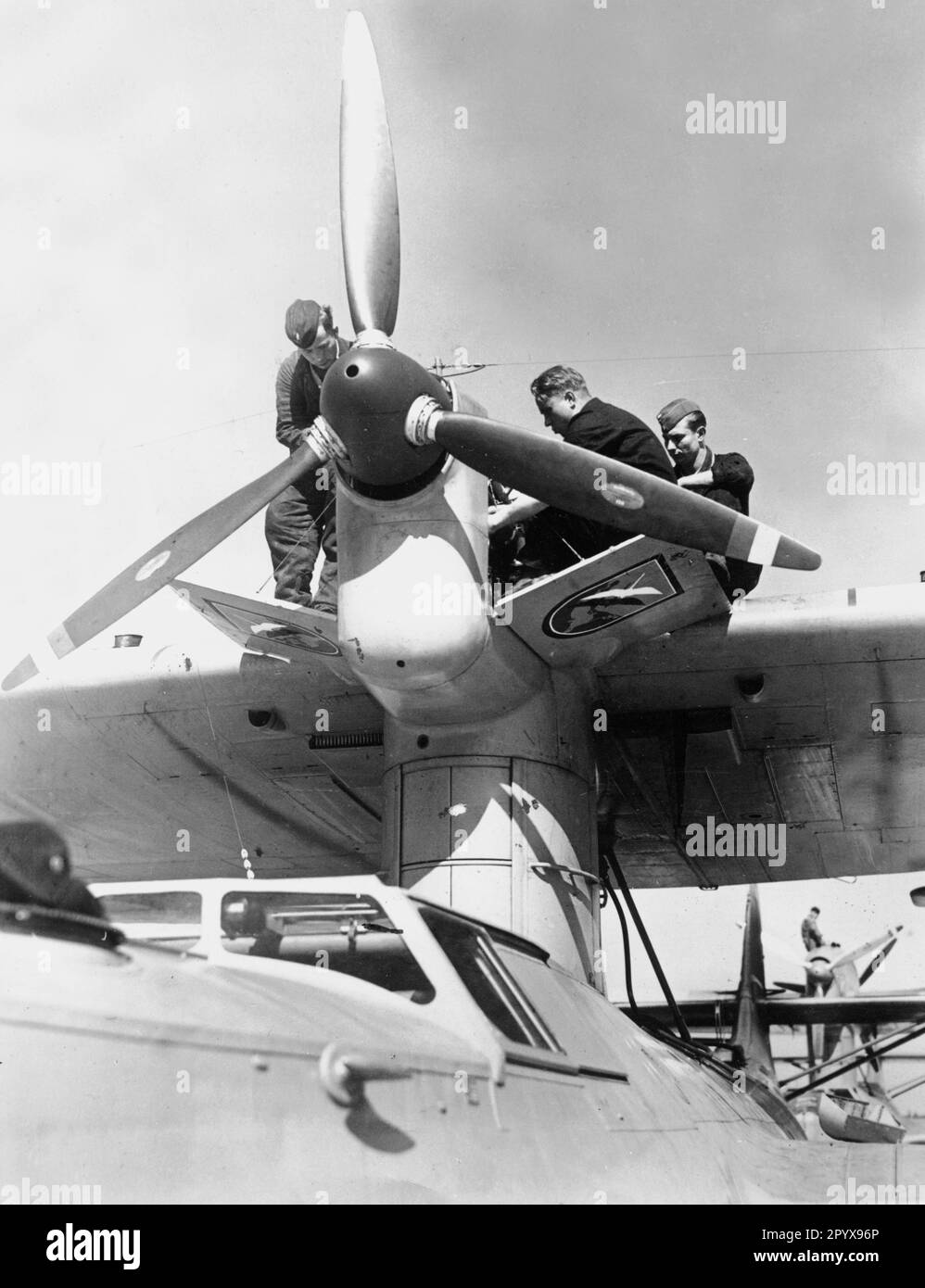 Wait at the engine of a flying boat Dornier Do 18. [automated ...