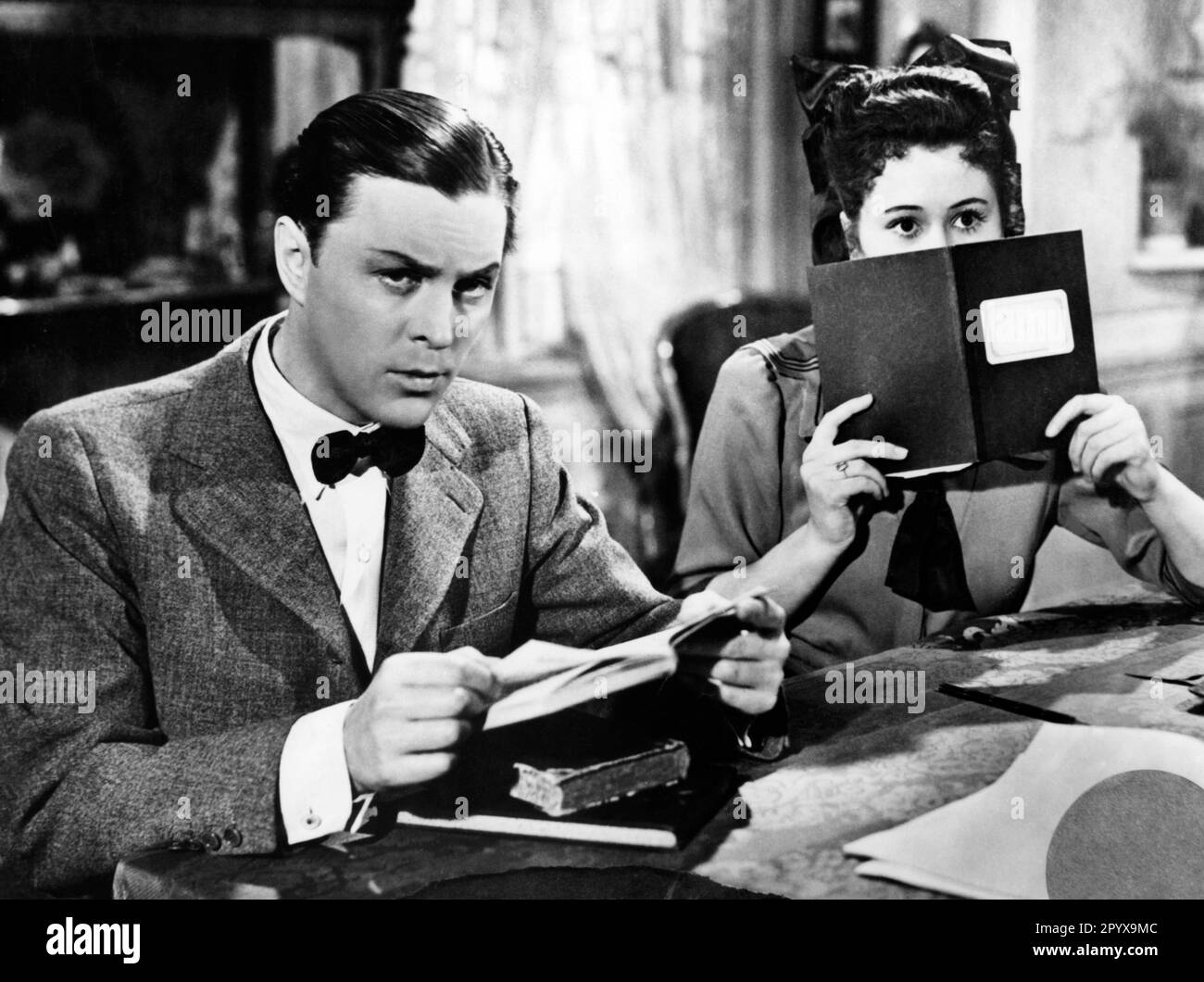 Hans Holt and Elfriede Datzig in the movie 'Schwarz auf Weiss', 1943 ...