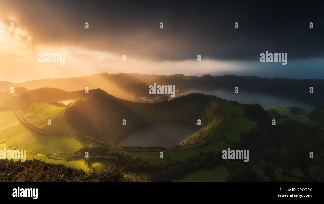 Aerial view of the volcanic mountains and lakes, with green farmland of ...