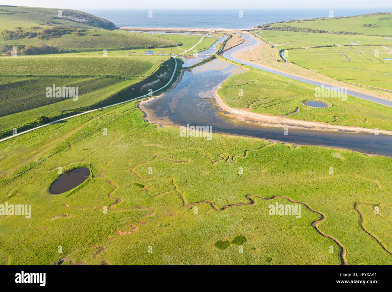 aerial views of the meanders of the cuckmere river in the south downs ...