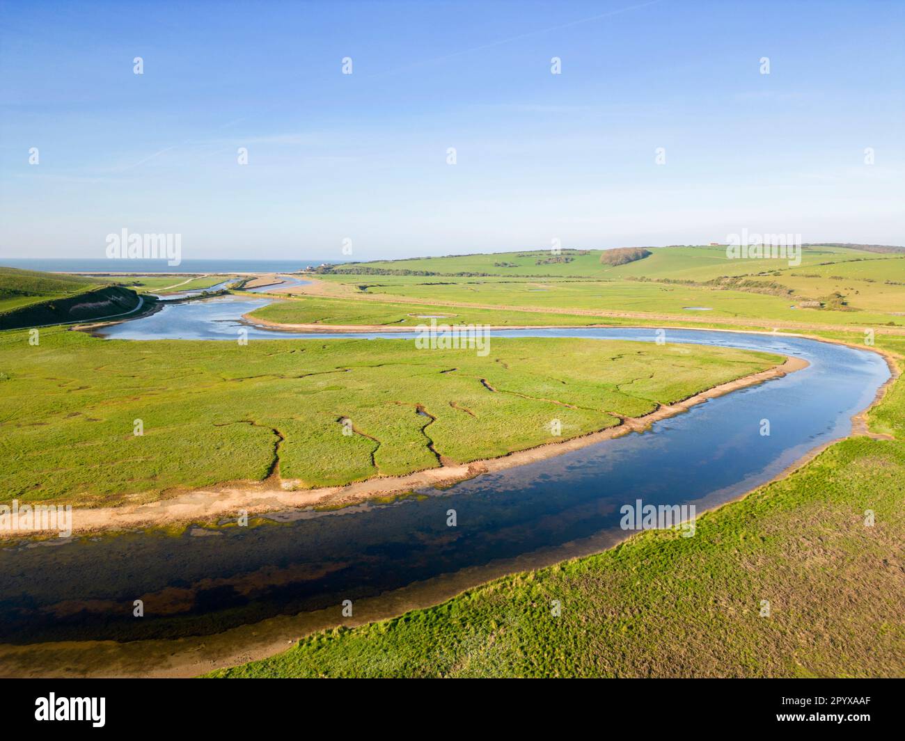 aerial views of the meanders of the cuckmere river in the south downs ...