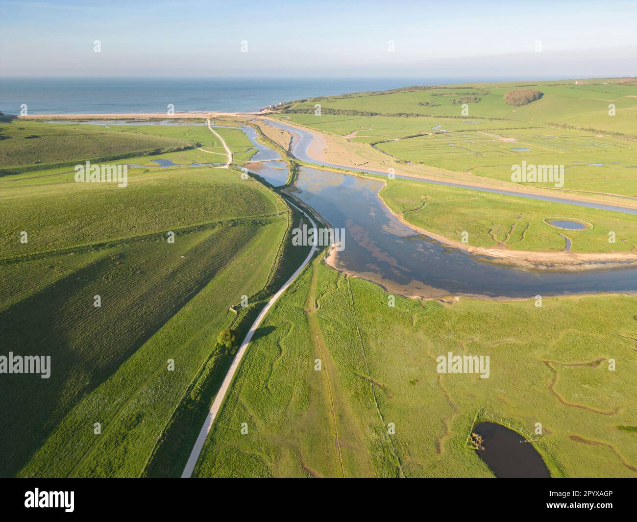 aerial views of the meanders of the cuckmere river in the south downs ...