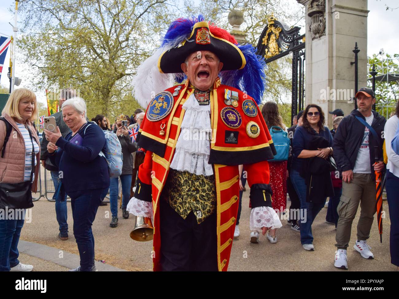 London, England, UK. 5th May, 2023. A town crier walks through the ...