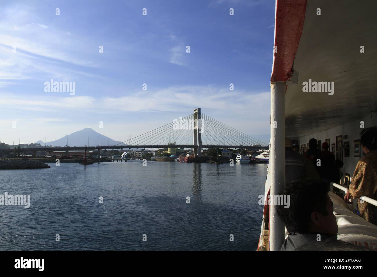 Part of a passenger ship approaching the port of Manado in Indonesia ...