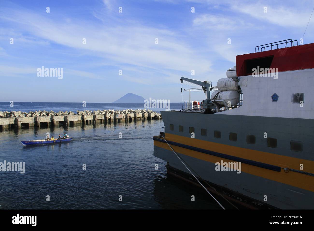 Part of a passenger ship approaching the port of Manado in Indonesia ...