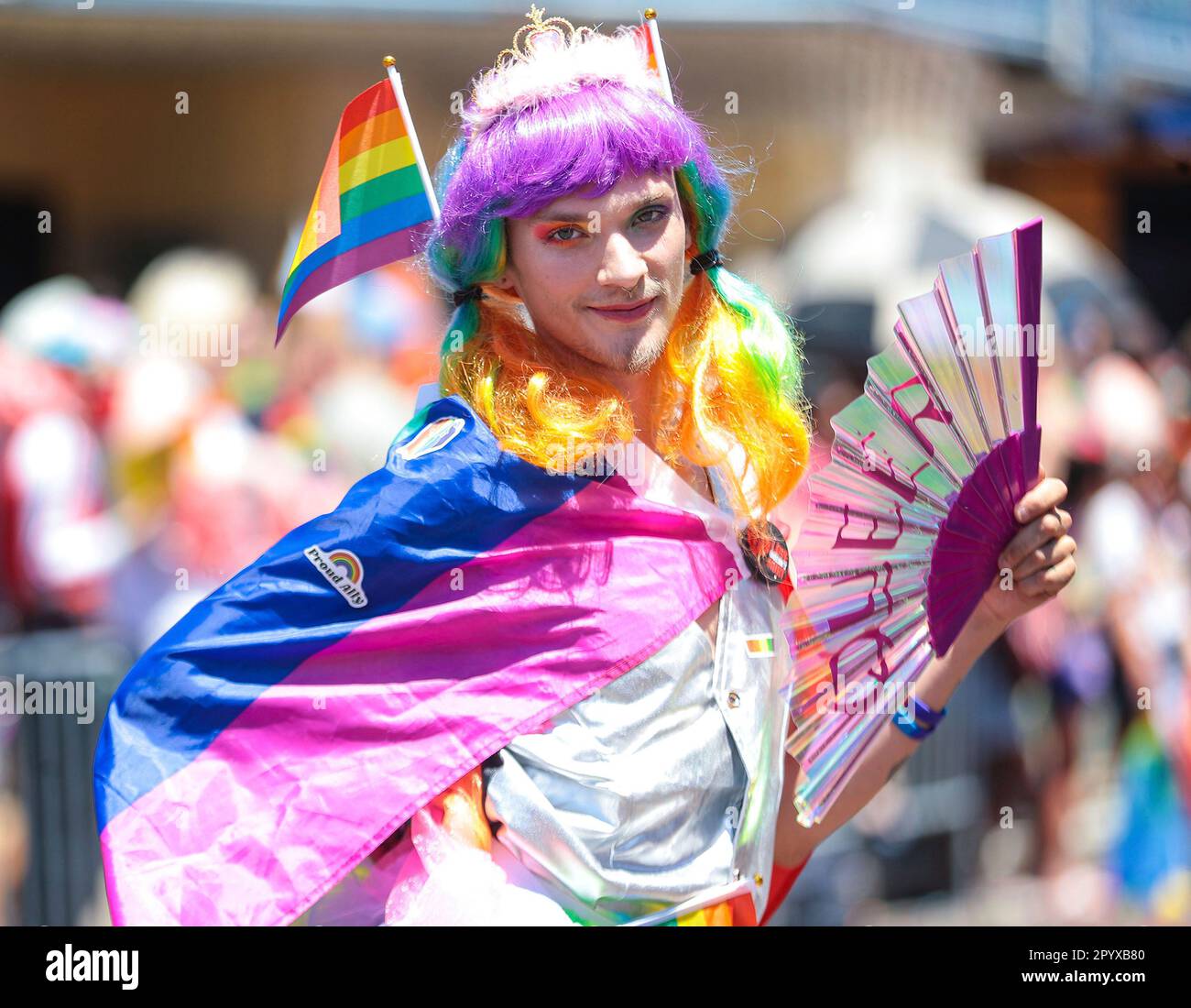 A person poses for a quick photo while marching in the Memphis PRIDE ...