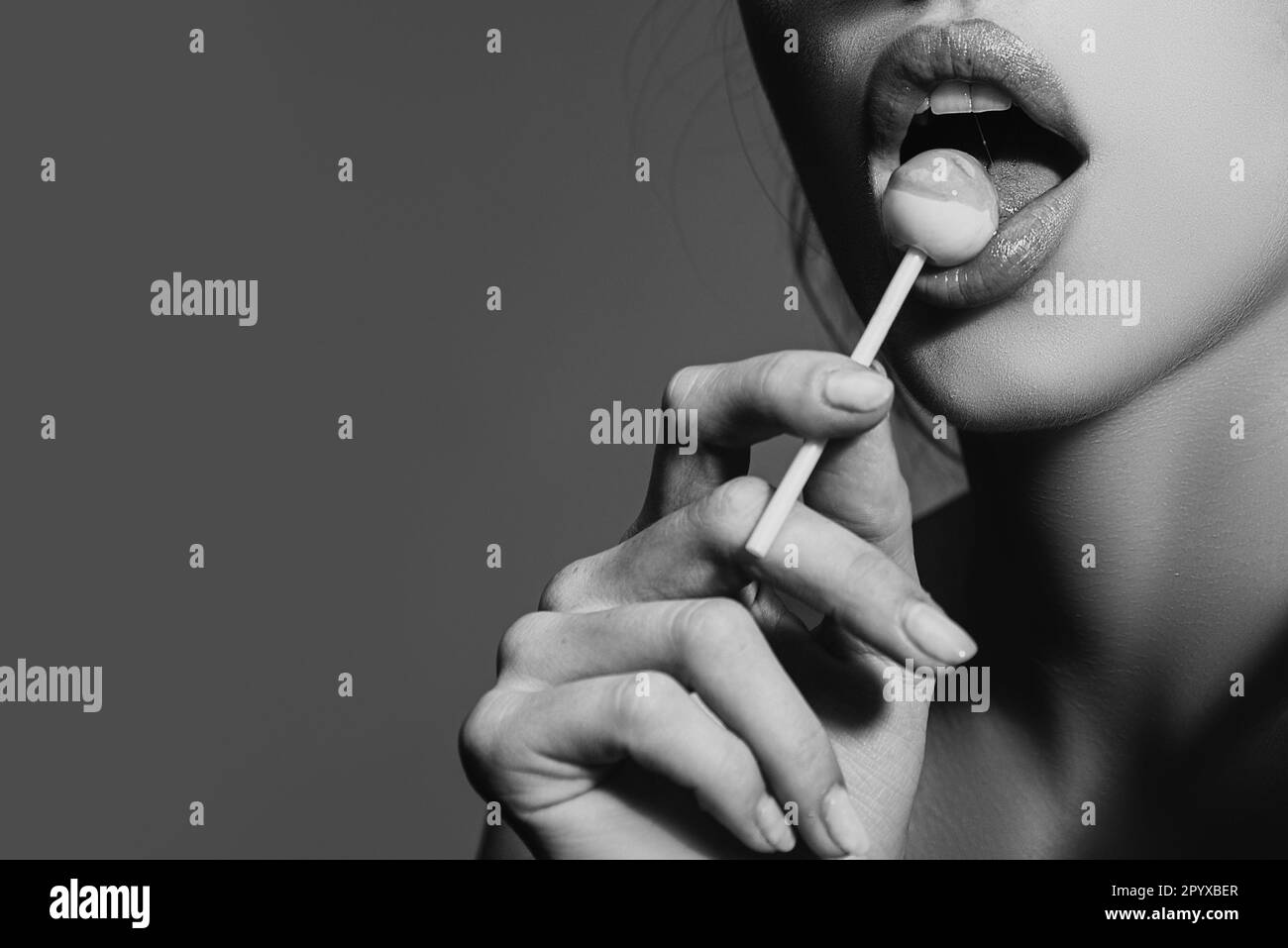 Teeth care. Woman with healthy teeth eat sweets Stock Photo - Alamy