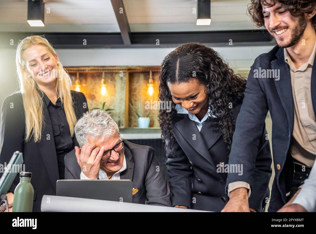Multiethnic joyful business people during a fun business meeting they ...