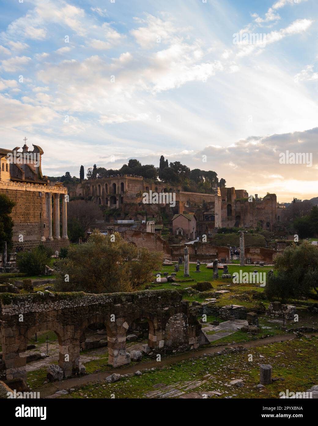 A view of a sprawling cityscape and ruins in the ancient city of Rome ...