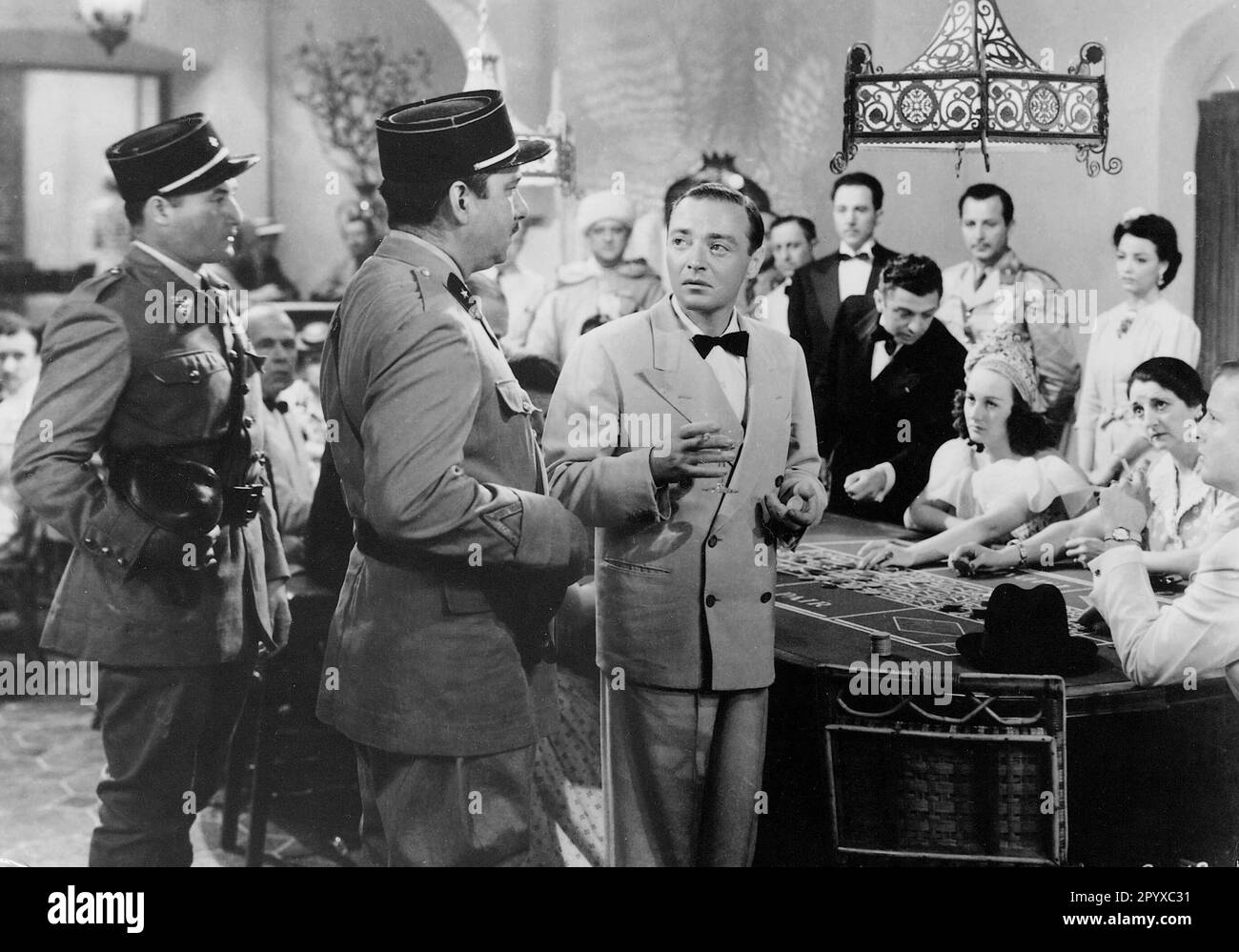 "Claude Rains (far left) as Louis Renault and Peter Lorre (mi.) as ...