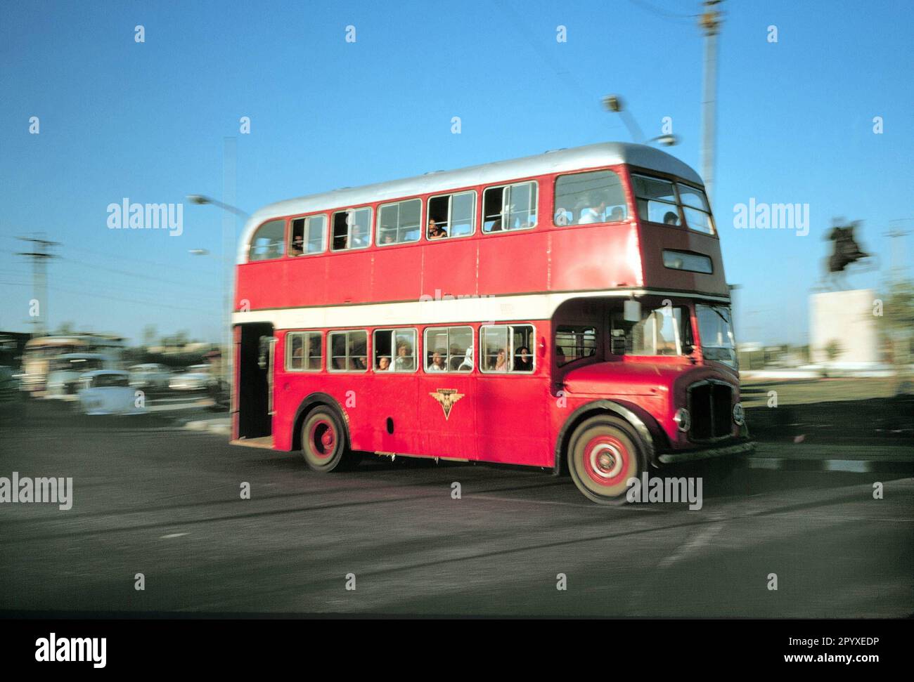 Street scene with double-decker bus in Baghdad Stock Photo - Alamy
