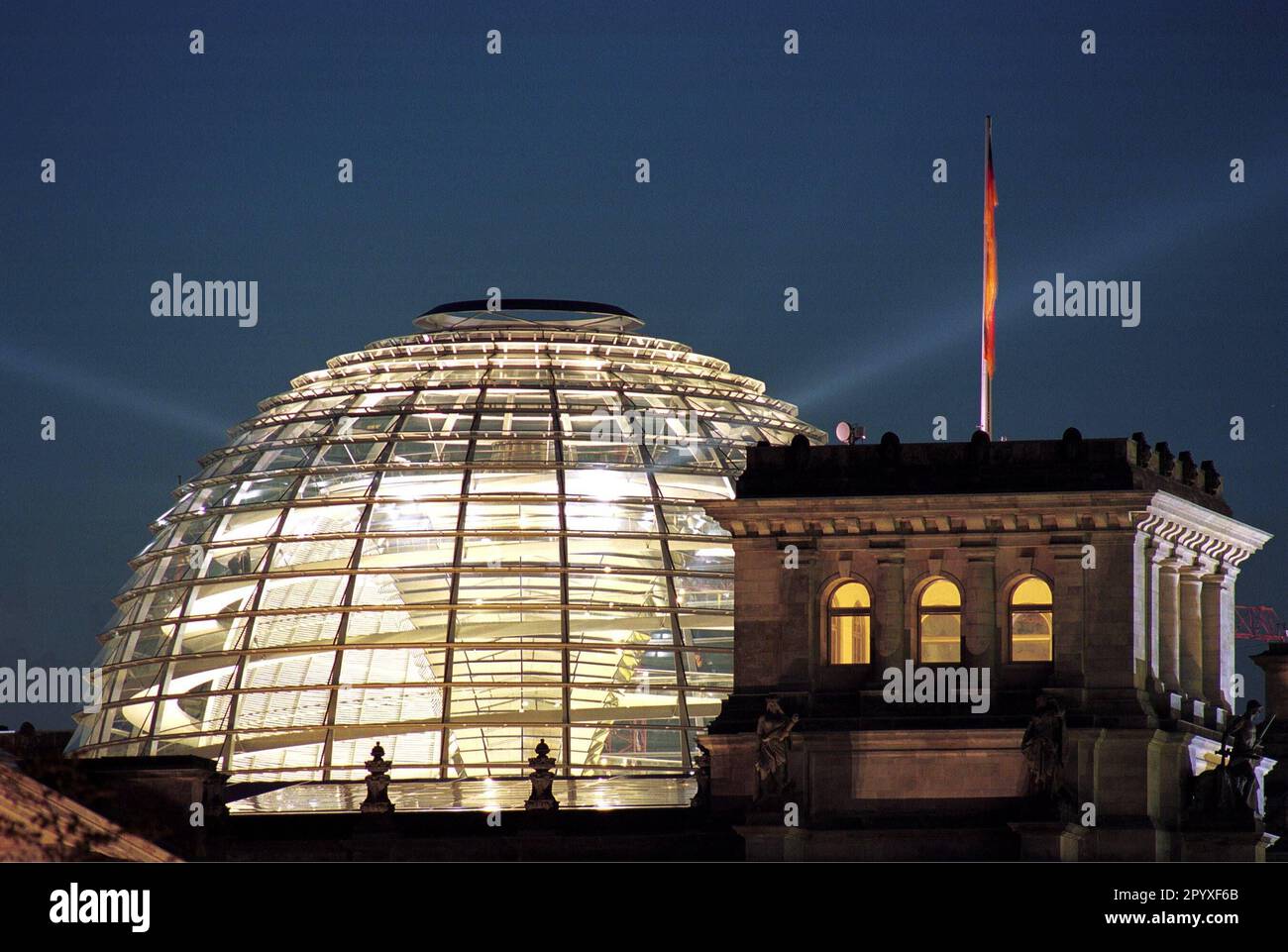 Illuminated glass dome of the German Reichstag, seat of the parliament ...