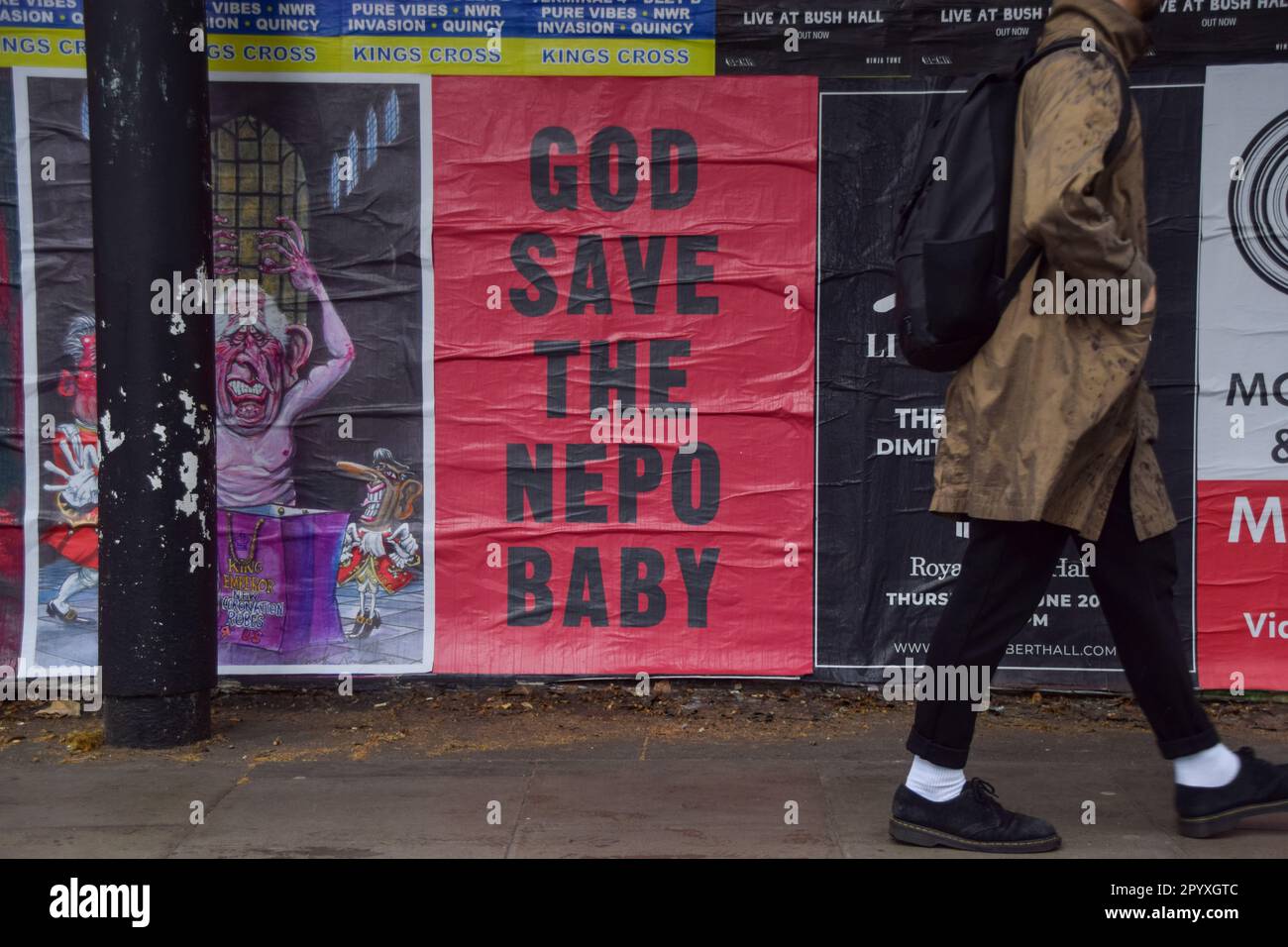 London, UK. 5th May 2023. Anti-monarchy posters, one reading 'God save ...