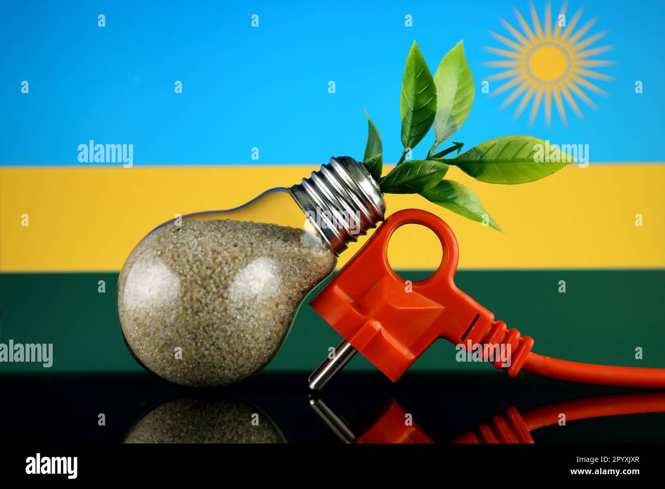 Plug, plant growing inside the light bulb and Rwanda Flag. Green eco ...