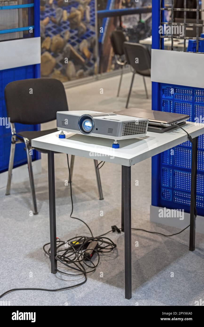 Conference Room Laser Video Projector With Notebook Pc at Desk Stock ...