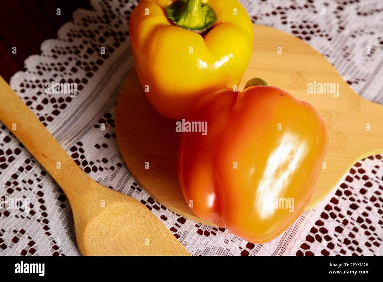 Fresh peppers on the table kitchen, in natural light Stock Photo - Alamy
