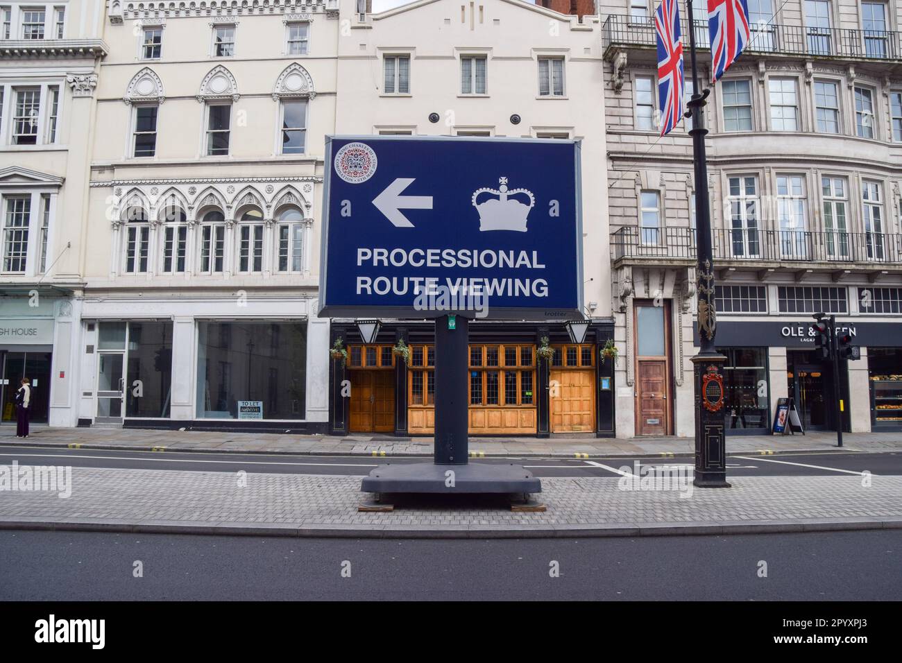 London, UK. 5th May 2023. Processional route viewing sign on The Strand ...