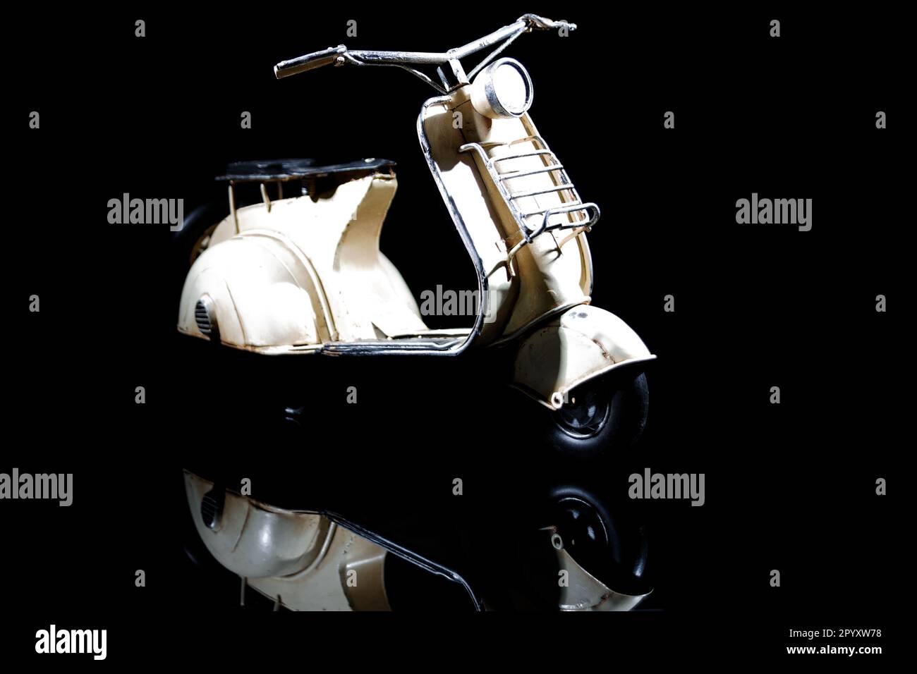 detailed view of motor scooter model on black table with black ...