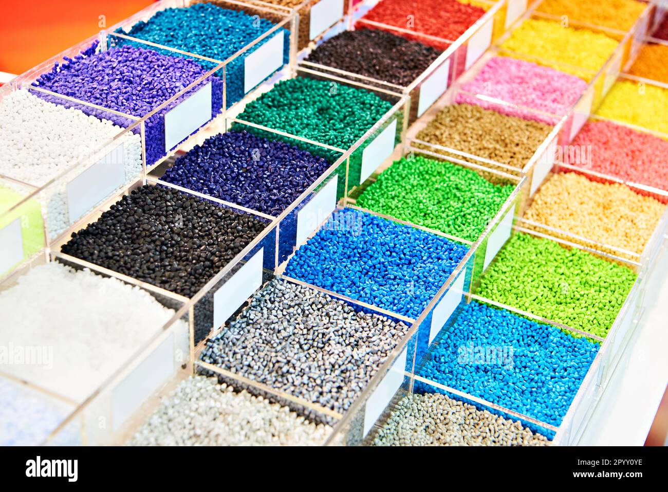 Colorful plastic granular polymer on exhibition Stock Photo - Alamy