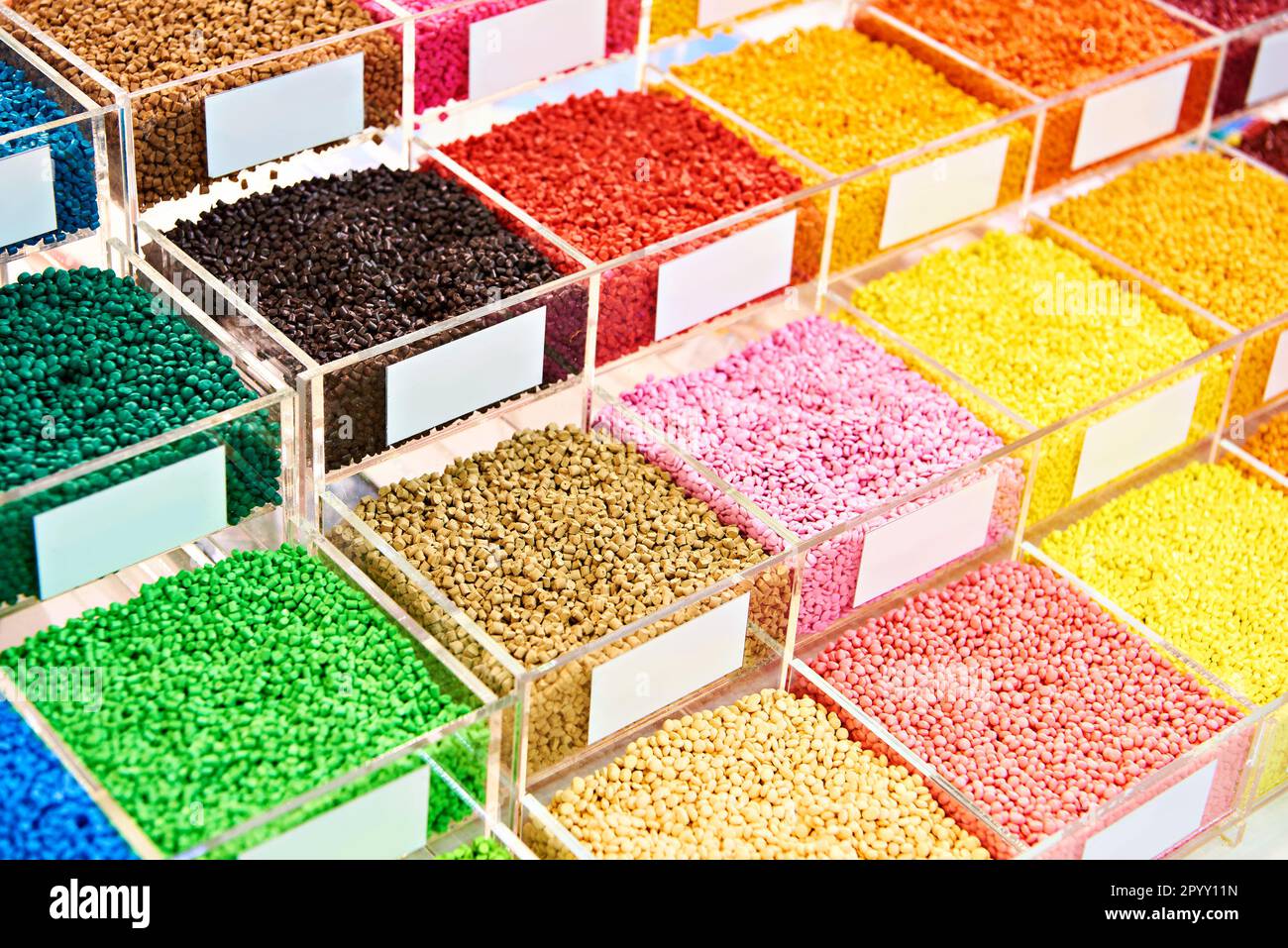 Colorful plastic granular polymer on exhibition Stock Photo - Alamy