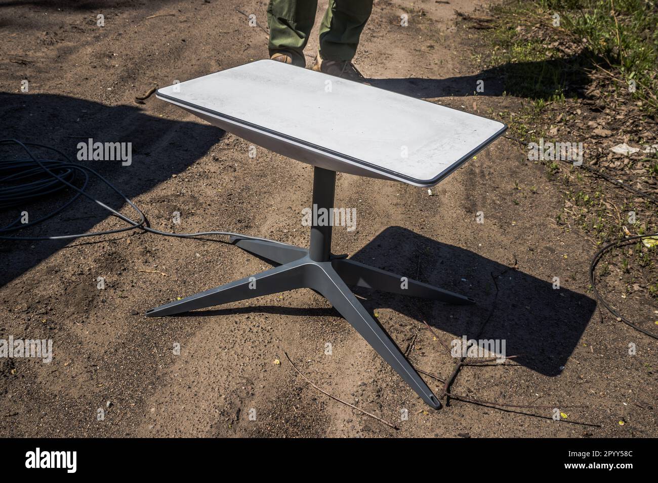 Ukrainian soldier using Starlink, a satellite internet constellation ...