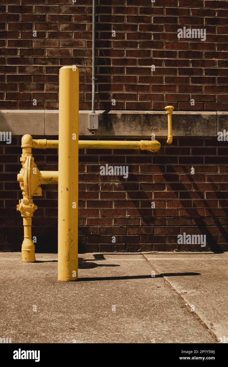 An industrial-style outdoor setting featuring a brick wall and a ...