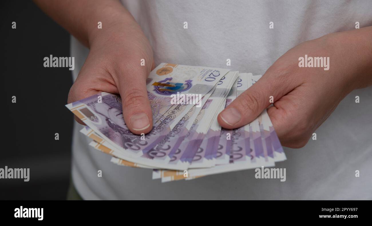 Woman euro banknotes calculator hi-res stock photography and images - Alamy