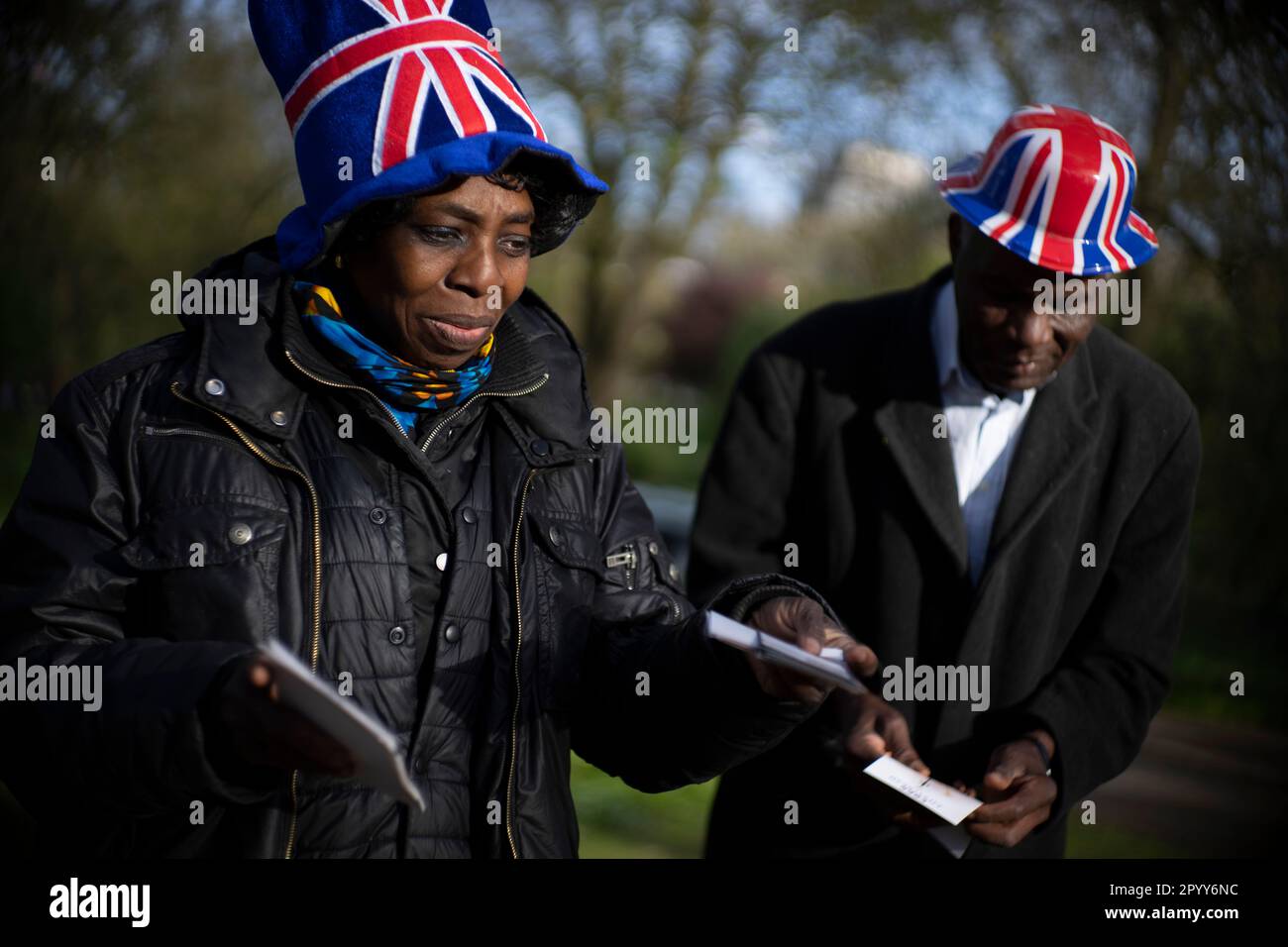 Delia and Gilbert hand out flyers along the King's Coronation route at ...