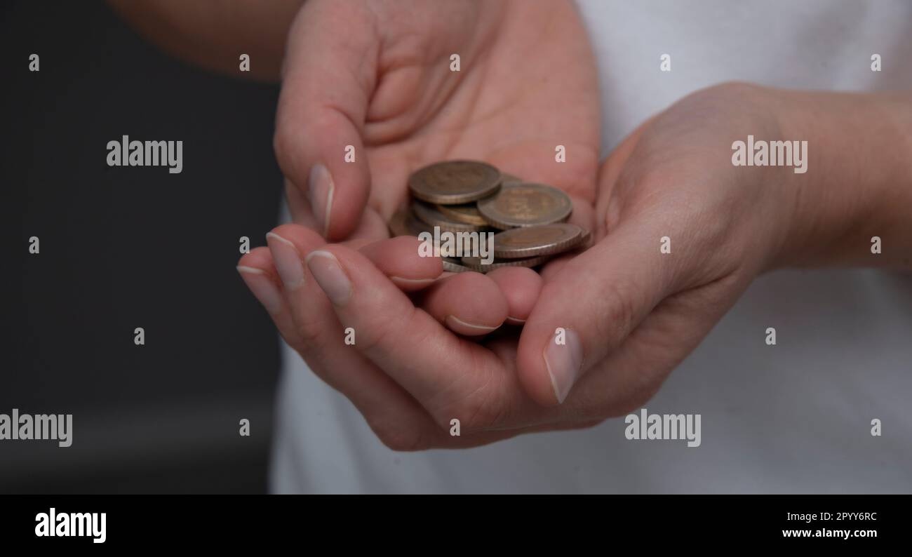 The hands with money Stock Photo - Alamy