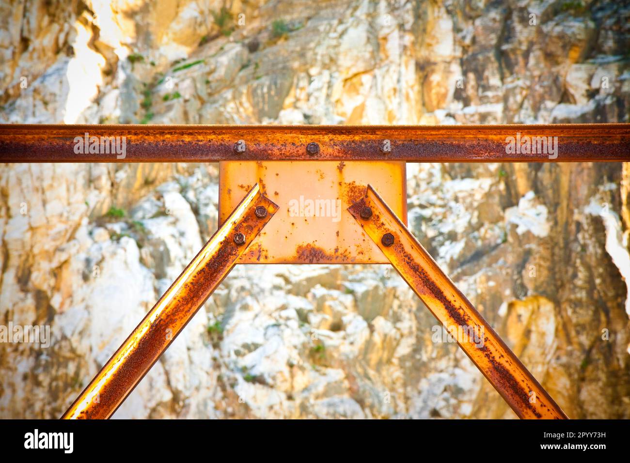 Old rusty iron structure with bolted metal profiles Stock Photo - Alamy