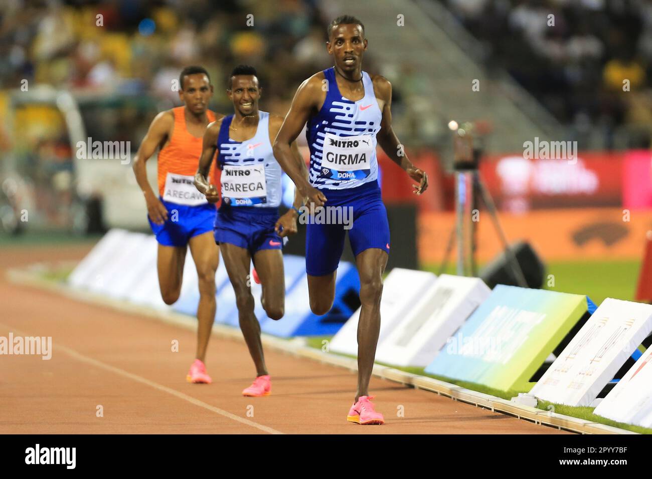 Lemacha Girma of Ethiopia in action to win the 300 meters during a ...