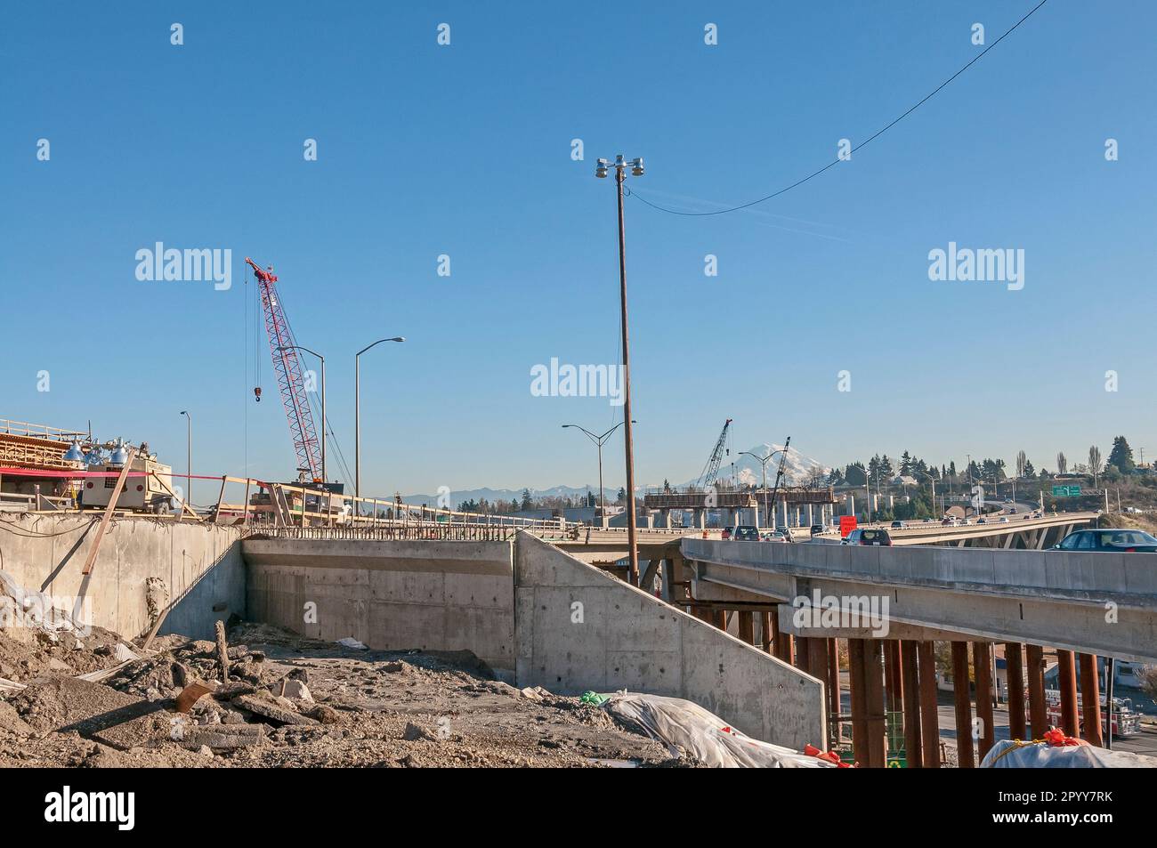 Unfinished concrete construction of an on-ramp to an elevated highway ...