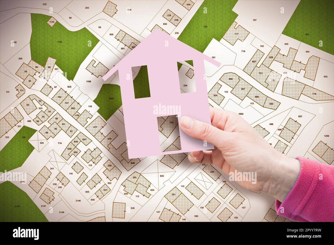 Vacant land for sale against an imaginary city map - vacant lot concept ...