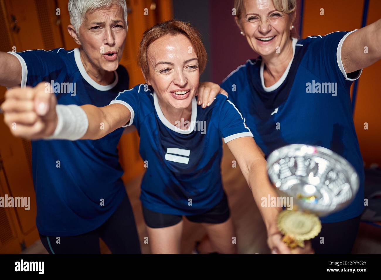 Young women cheering for team hi-res stock photography and images - Alamy