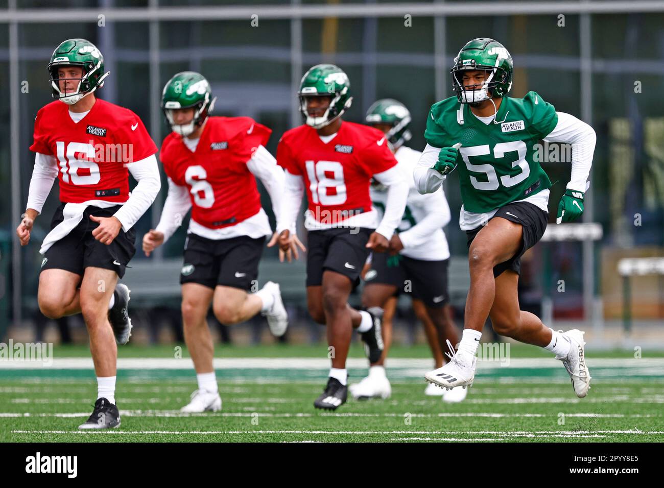 New York Jets linebacker Zaire Barnes (53) runs with quarterbacks Jack ...
