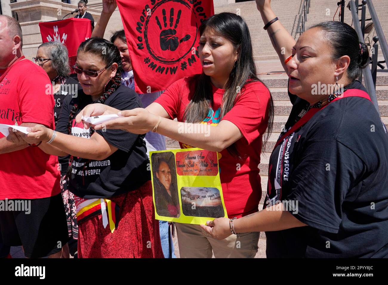 Nickie Saunders, center, of Tecumseh, Okla., releases a butterfly ...