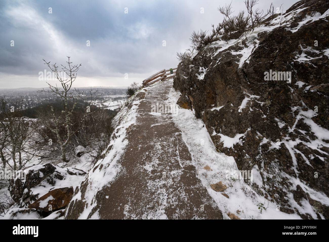 Narrow pathway to the peak of Mount Douglas in Victoria, Canada in ...