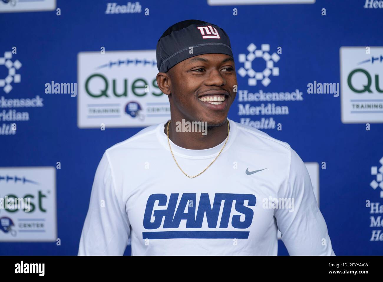 Cornerback Tre Hawkins III talks to reporters after an NFL football ...