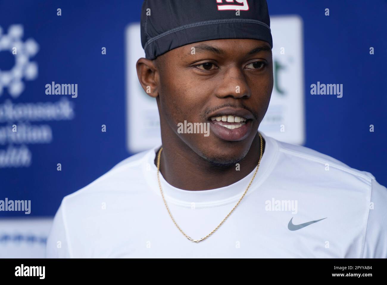 Cornerback Tre Hawkins III talks to reporters after an NFL football ...