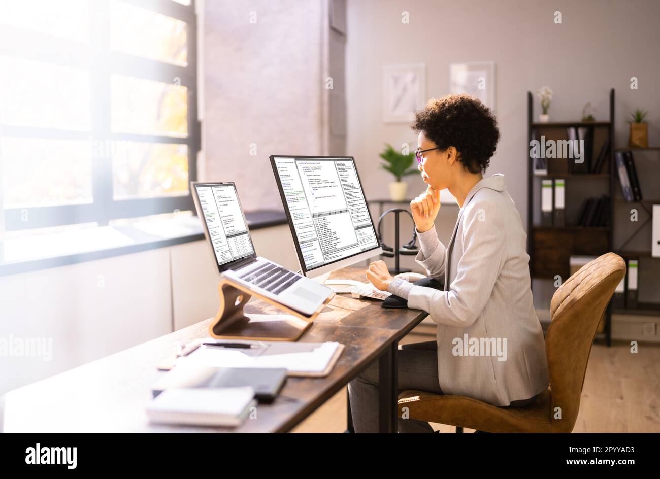 African American Woman Programmer. Girl Coding On Computer Stock Photo ...
