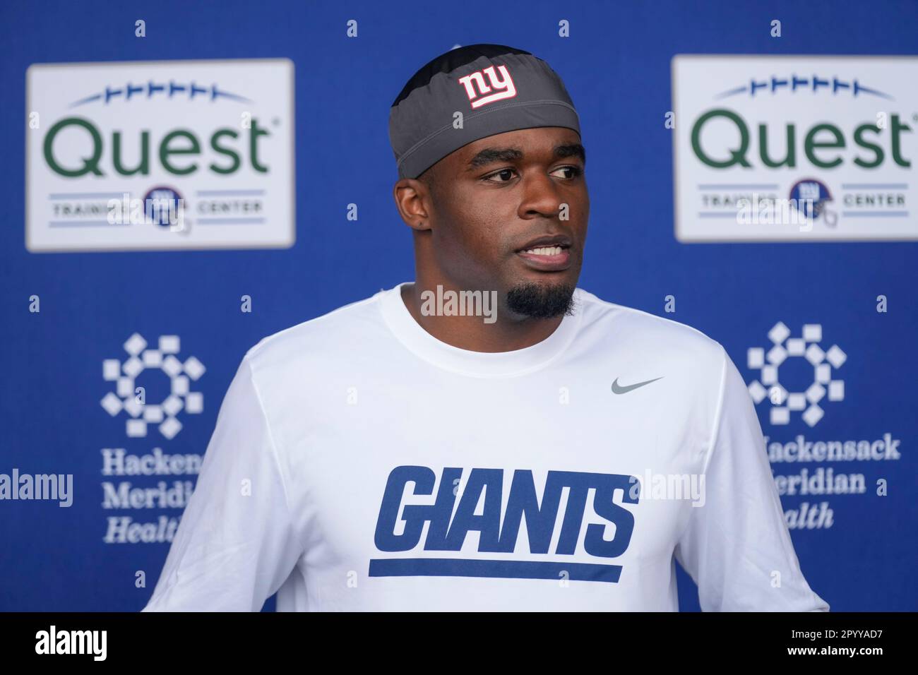 Gervarrius Owens talks to reporters after an NFL football rookie camp ...