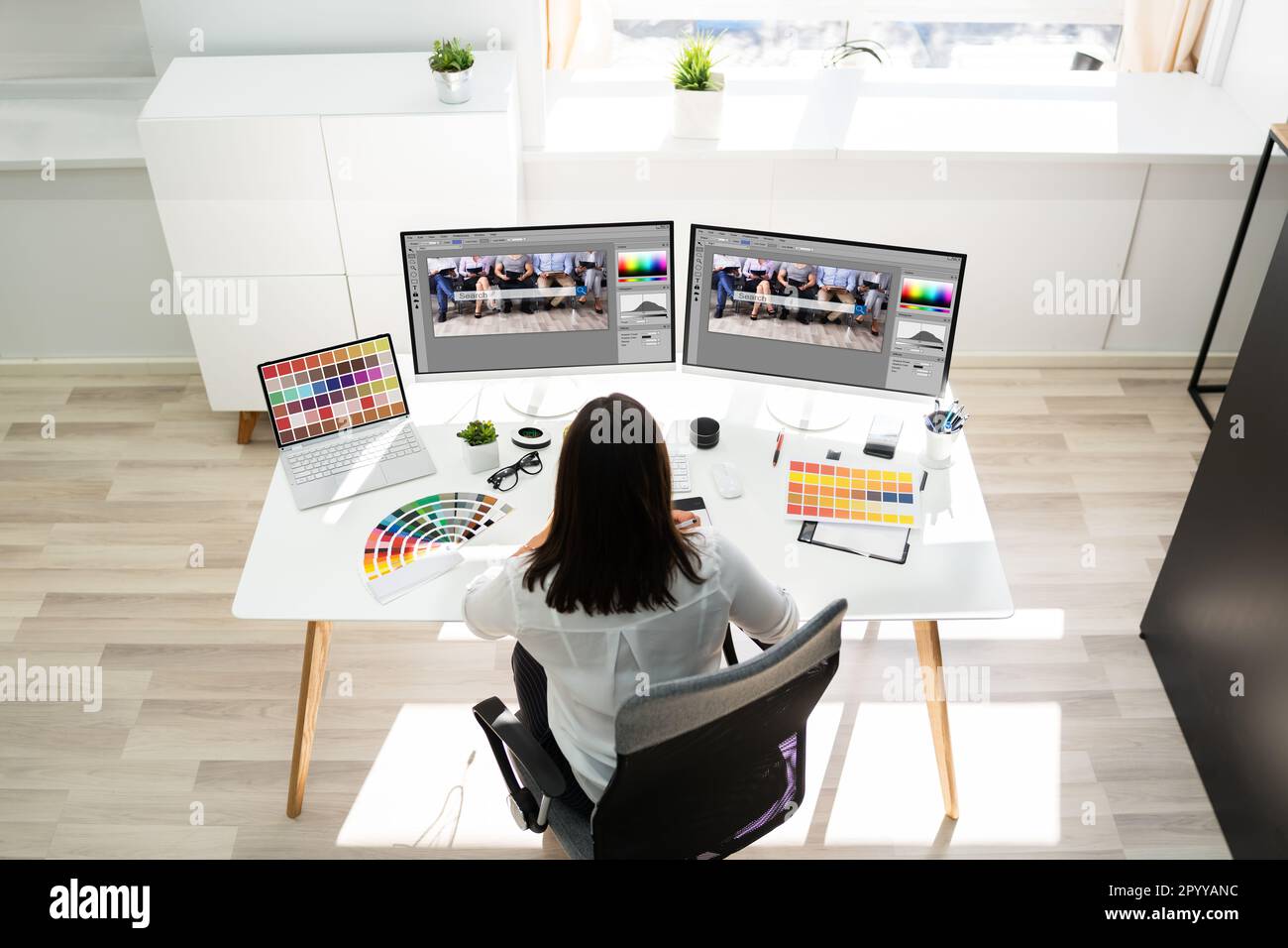 Graphic Designer Artist Working On Multiple Computer Screens Stock ...