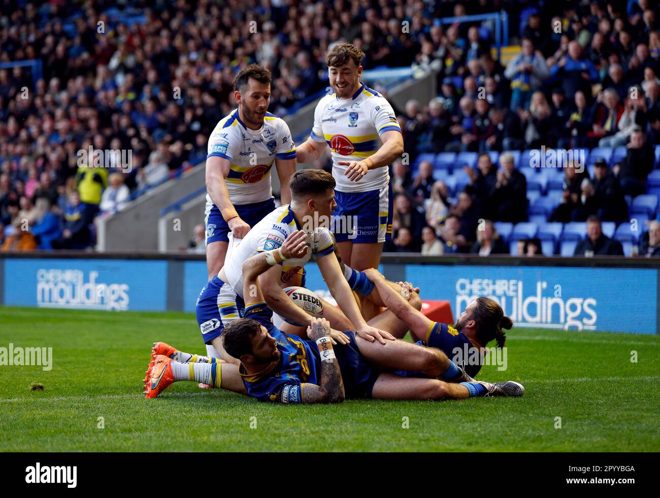 Warrington Wolves' Josh Thewlis celebrates scoring a try during the ...